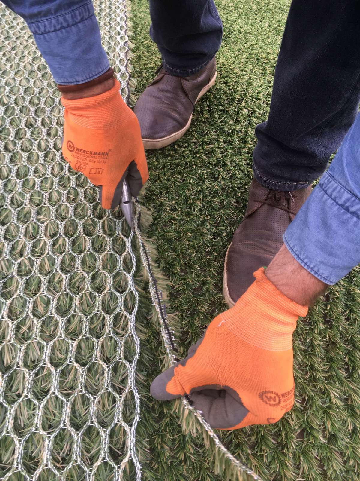 How is Urban Hybrid artificial grass installed?